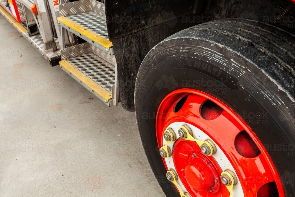 Image of Detail of wheel and steps to firetruck - Austockphoto