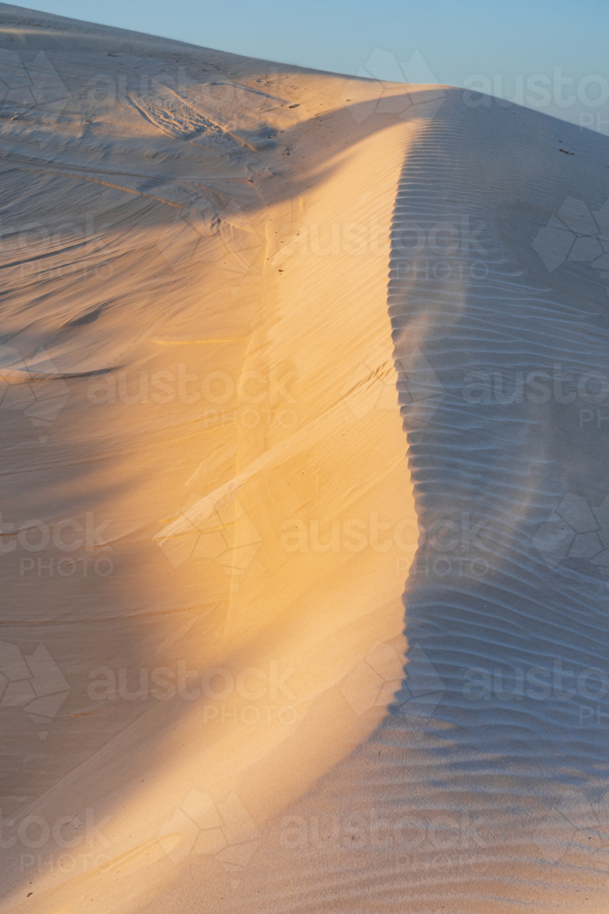 Image of Detailed view of ripples and lines on the side of sand dunes ...