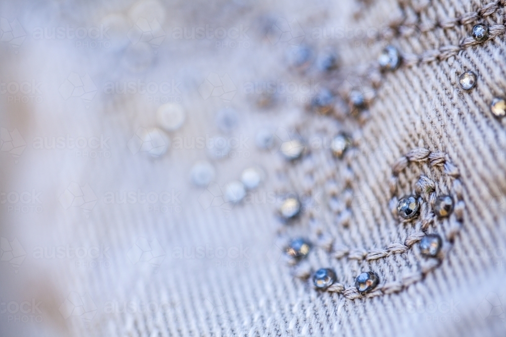 Image of Diamante sparkles and threads making pattern on clothing ...