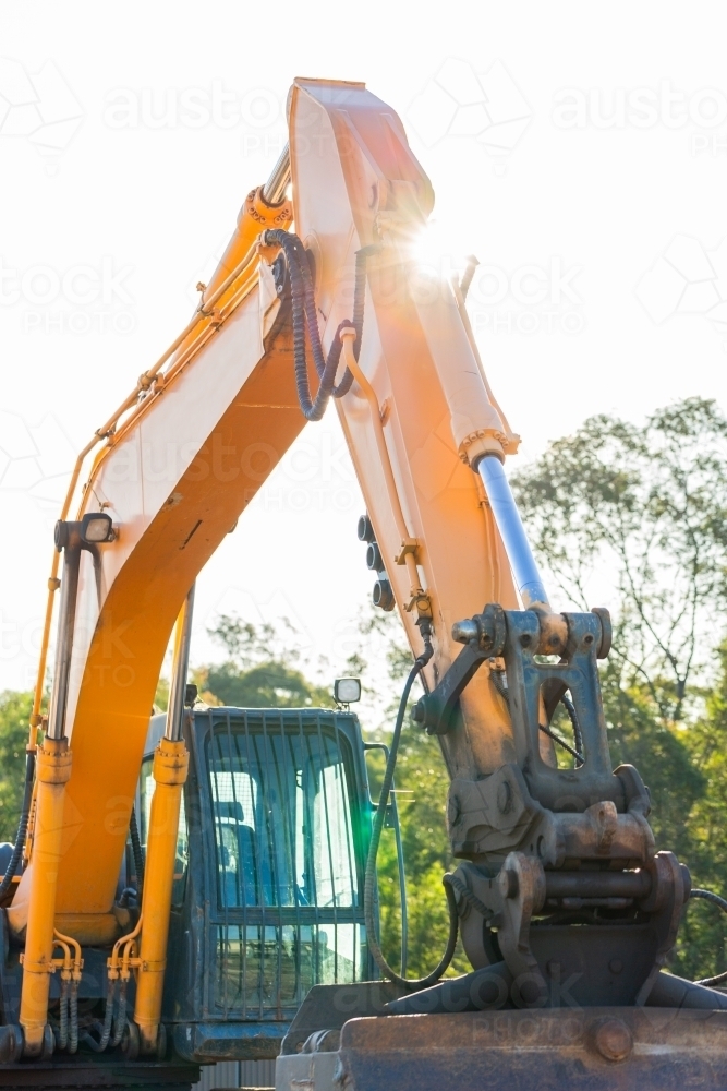 Image of digger excavator on worksite - Austockphoto
