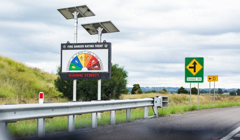 Image of Digital fire danger rating sign on overcast day - Austockphoto