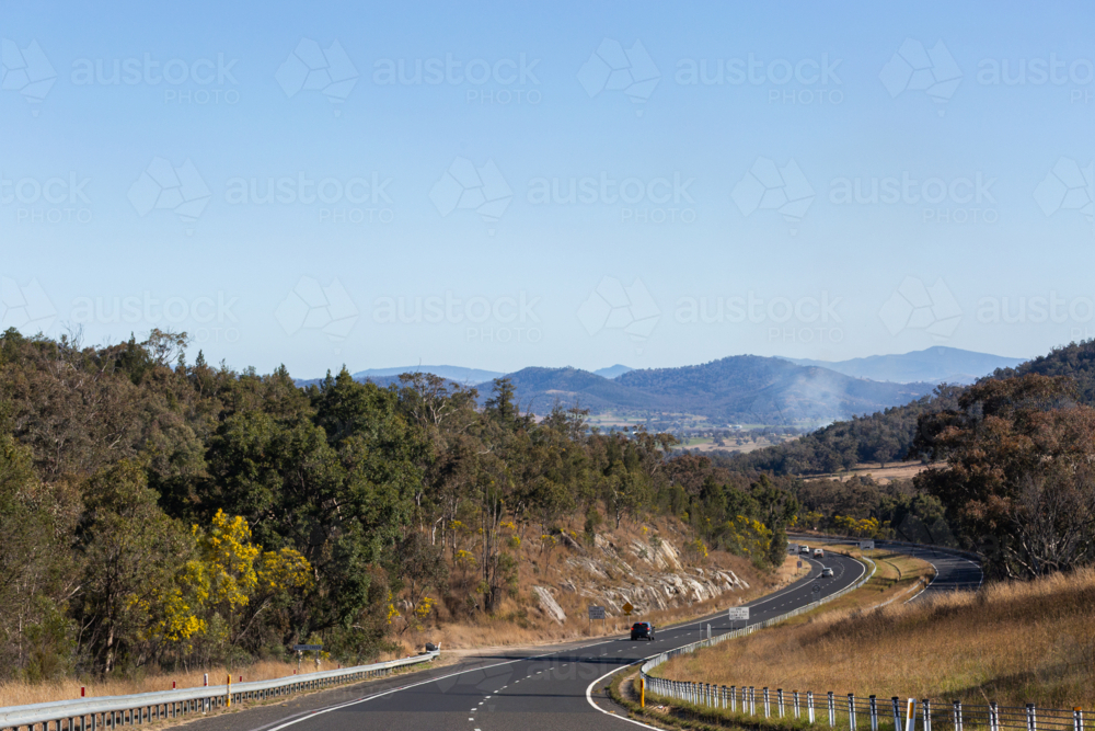 Image of Divided highway roads through remote Australian landscape ...
