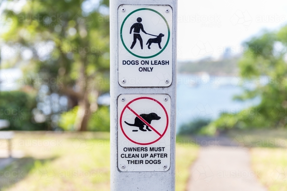 Image of Dog owner responsibilities sign - Austockphoto