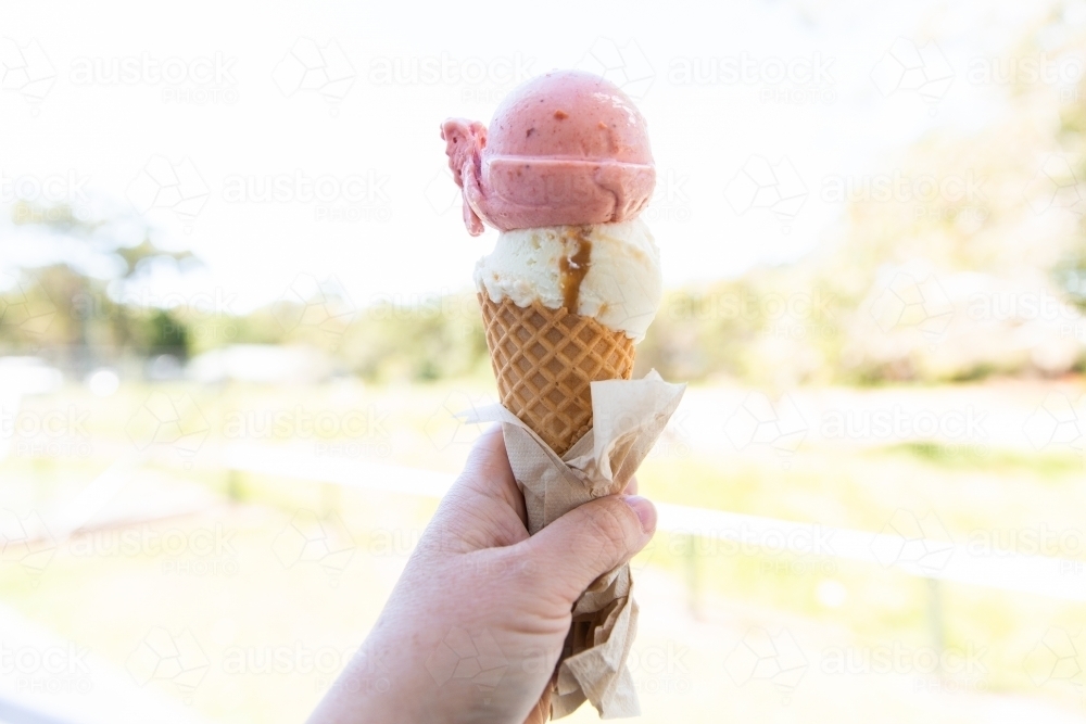 Image of double scoop icecream cone - Austockphoto
