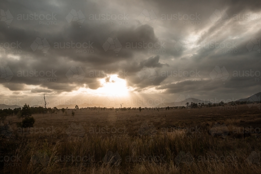 Image of dramatic sunset in Central Queensland with sun rays shining ...