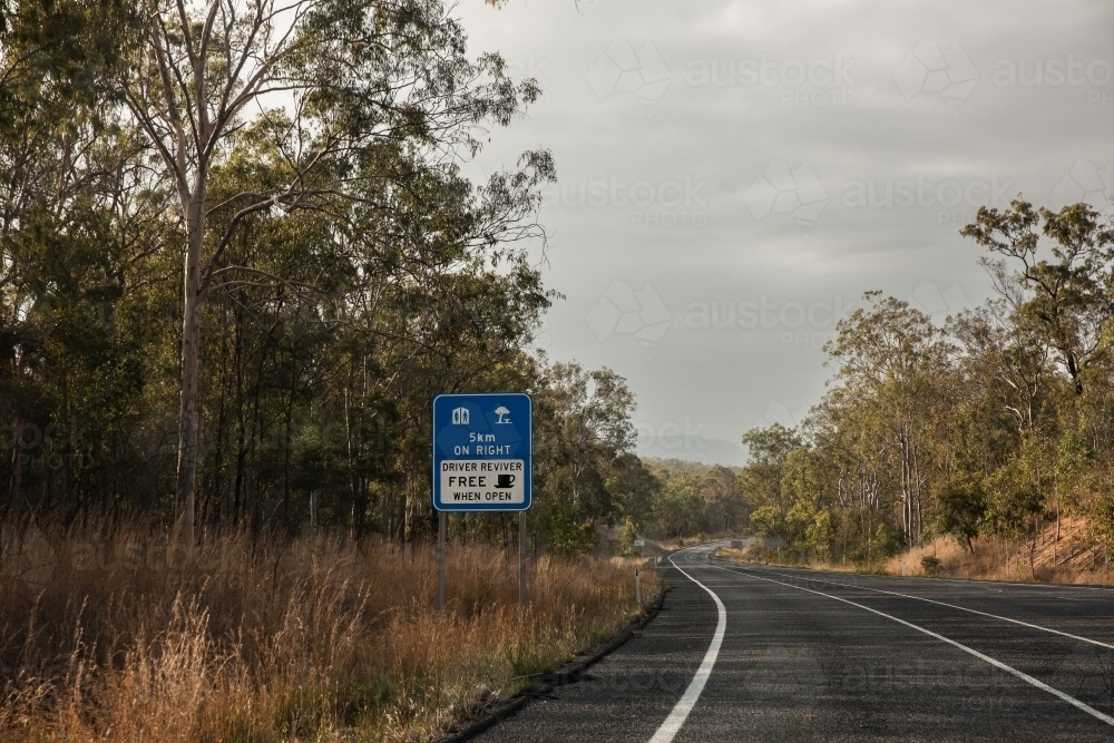 Image of Driving past road signs on an empty stretch of the Bruce ...