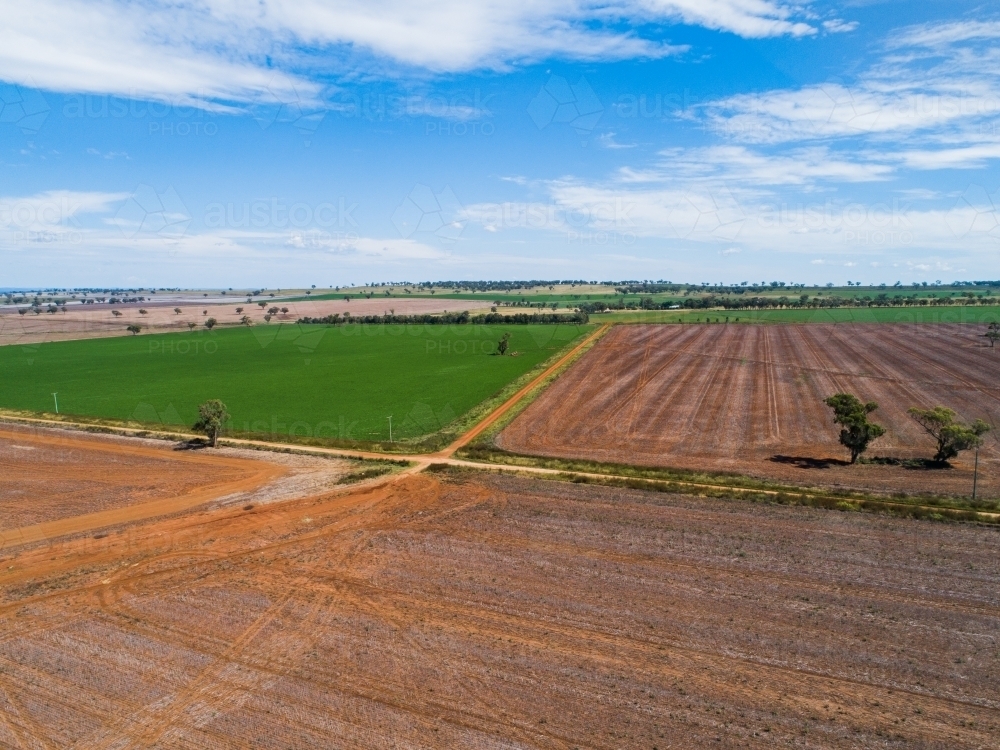 Image of Drone aerial view of brown dirt in paddock after crop harvest ...
