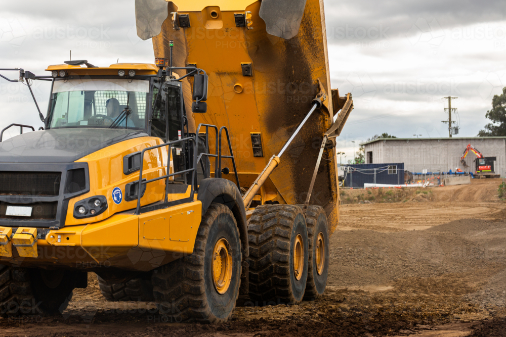 Image of dump truck on construction site doing earthworks building ...