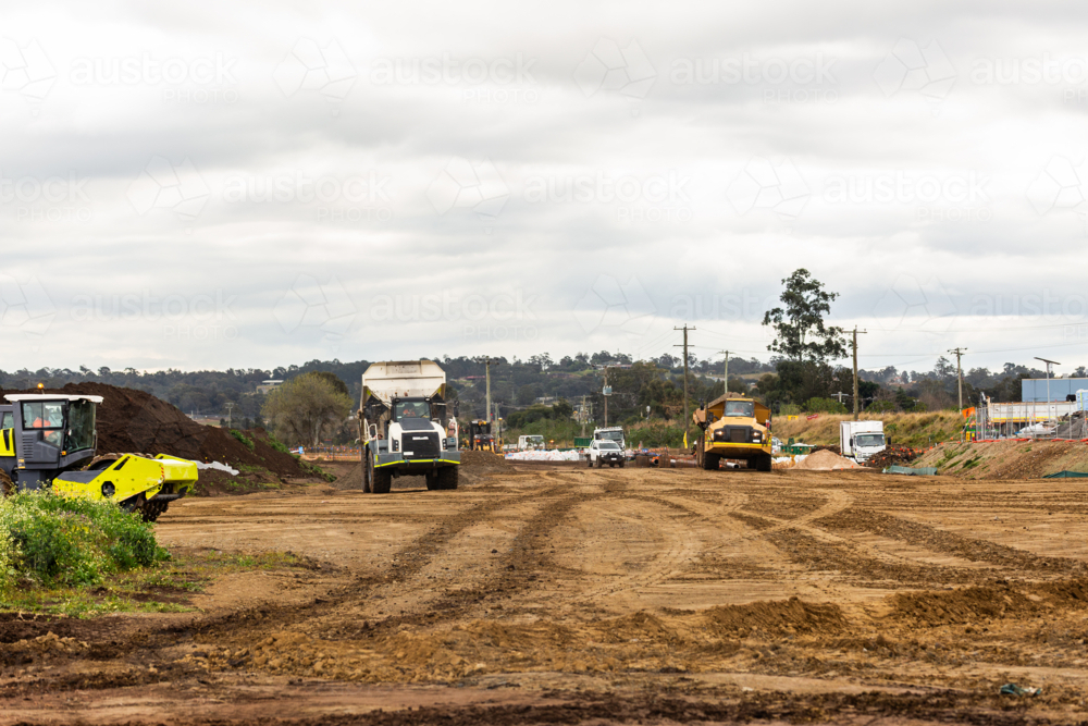 Image of dump truck on construction site with earthworks building ...