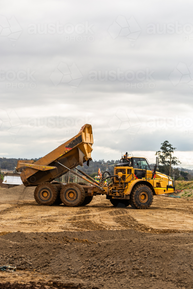 Image of dump truck working on infrastructure construction site ...