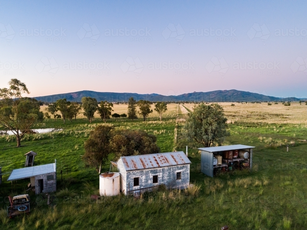 Image of dusk light over old farm buildings in paddock of aussie farm ...