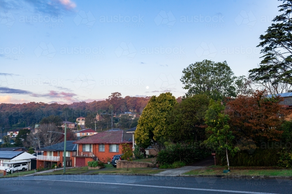 Image of dusk light over outer suburb of Newcastle showing house and ...