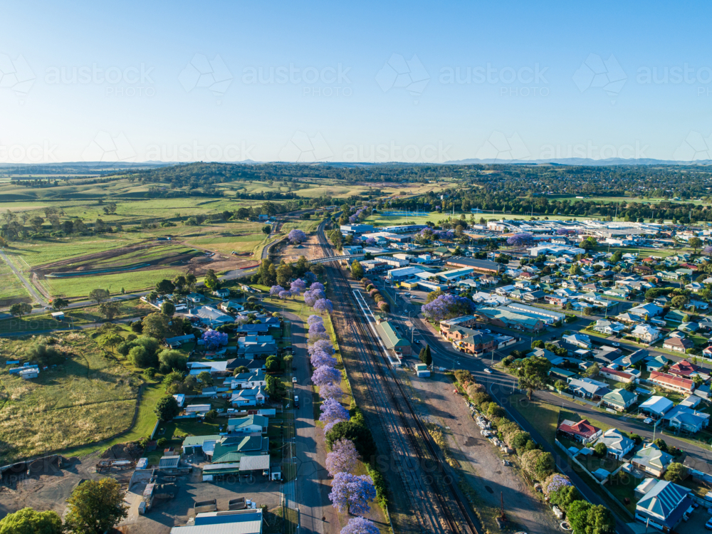 Image of Edge of country town in Australia in early summer with purple ...
