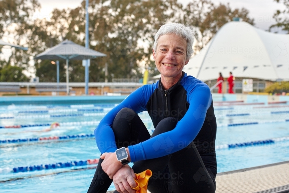 Image of Elderly swimmer at pool - Austockphoto