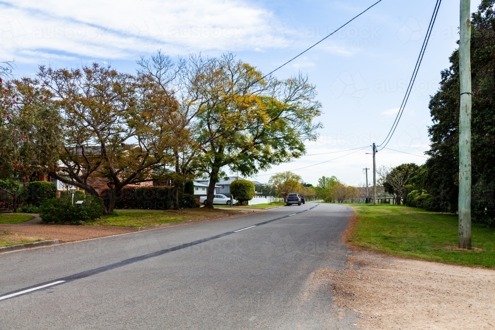 Image of Electricity power lines connecting to houses across the street ...