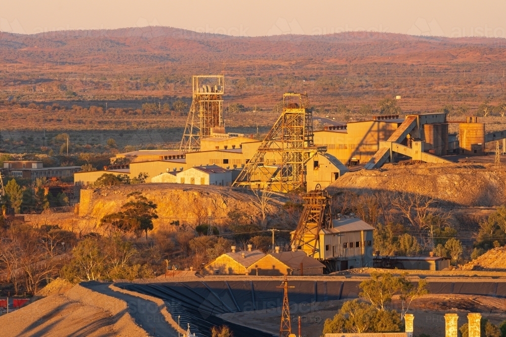 Image of Elevated view of a working mine and surrounding hills in the ...