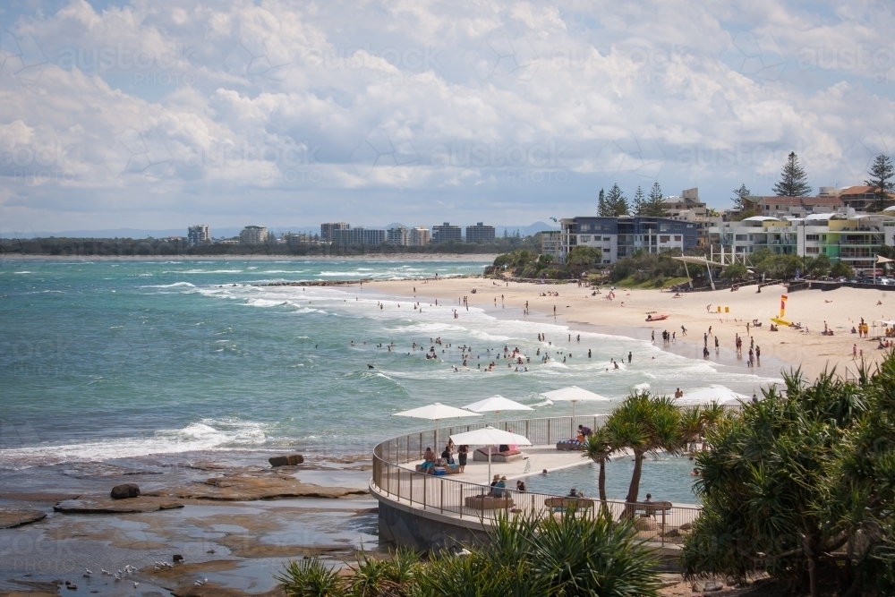 Image of Elevated view of people on a suburban beach - Austockphoto