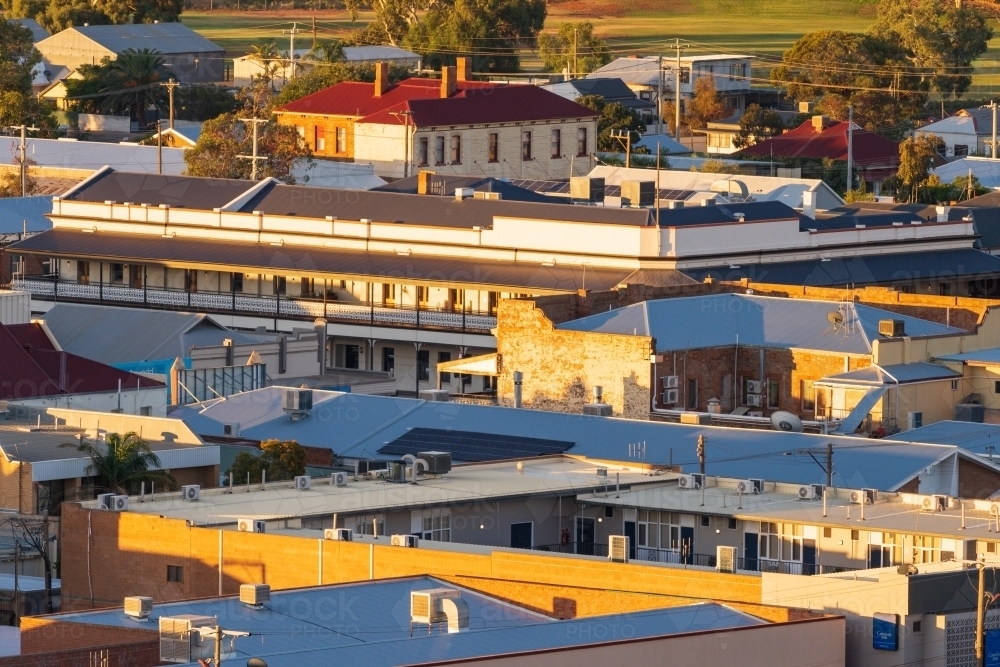 Image of Elevated view over the rooftops of an outback city - Austockphoto