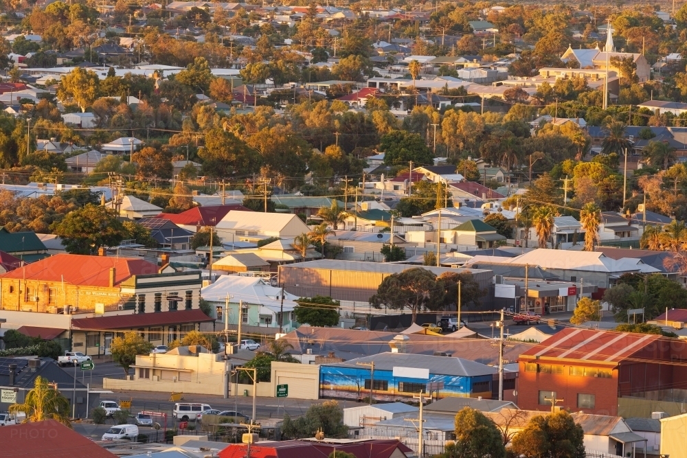 Image of Elevated view over the rooftops of an outback city - Austockphoto