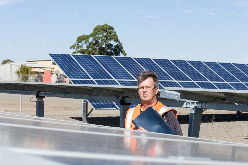 Image of Employee at a Solar Panel plant - Austockphoto