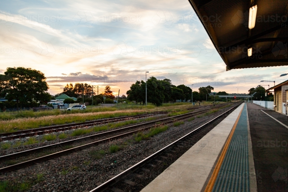 Image of Empty railway station at dusk in country town of Singleton ...