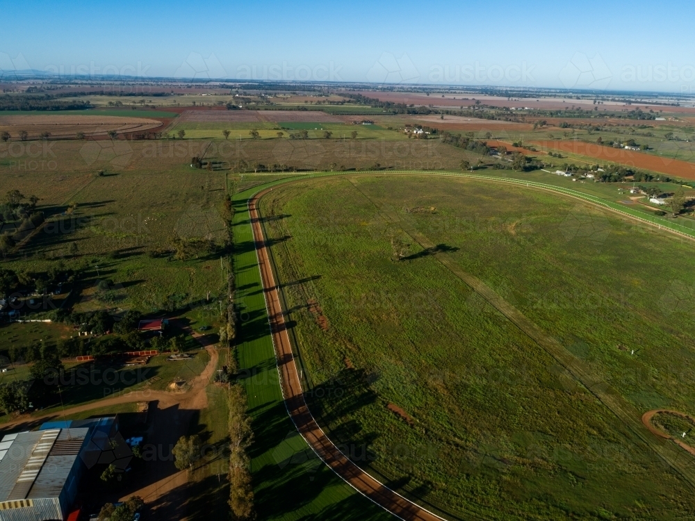 Image of Empty showground oval and racecourse track seen from the air ...