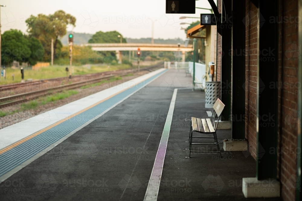 Image of Empty train station in country setting - Austockphoto
