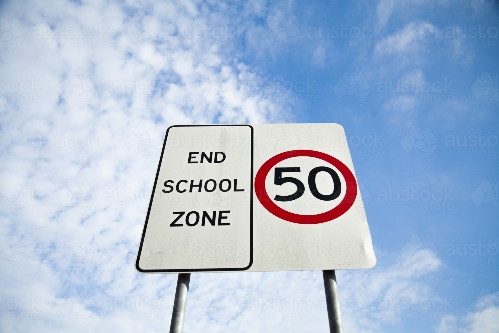 Image of End school zone 50 sign - Austockphoto
