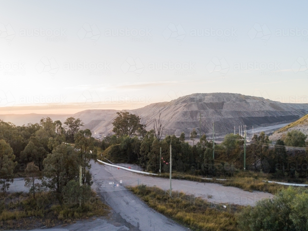Image of Entrance to open cut mine site at dusk Mount Thorley, NSW ...