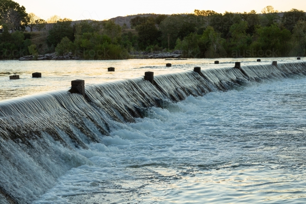 Image of evening light on the water at Ivanhoe Crossing - Austockphoto