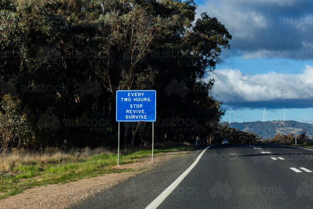 Image of every two hours stop revive survive sign beside road ...