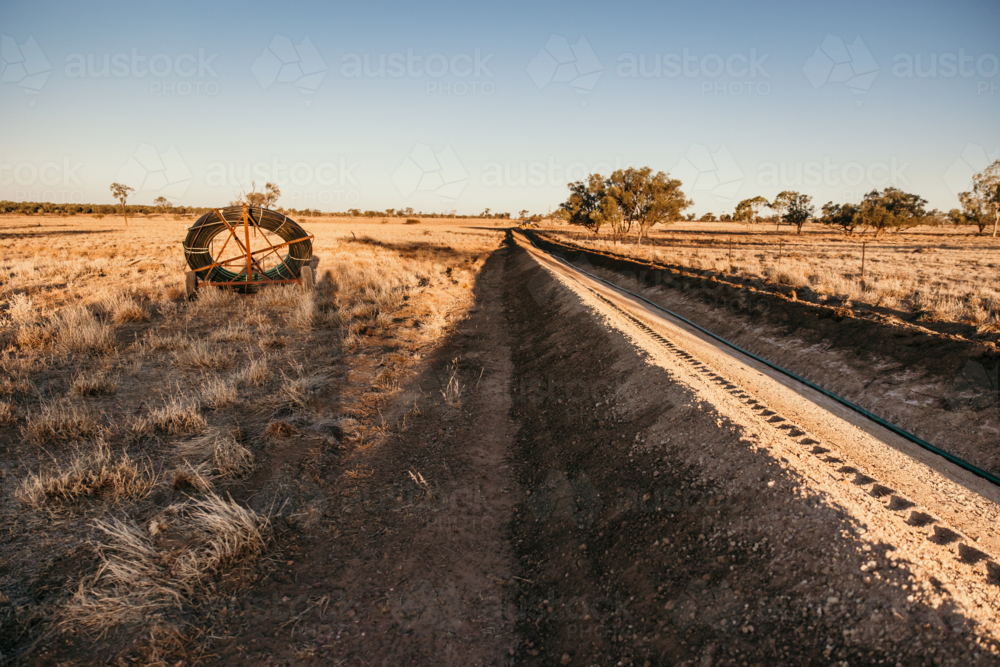 Image of Excavated land to lay pipelines on a dry grassland - Austockphoto