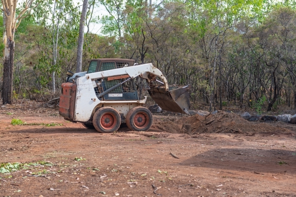 Image of Excavator clearing - Austockphoto