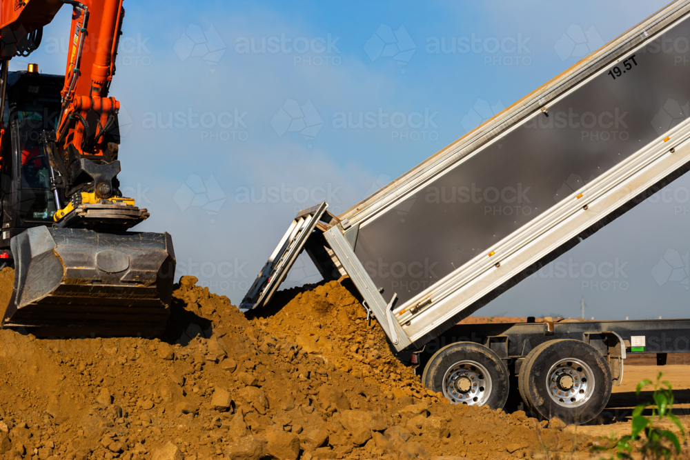 Image of Excavator earthmoving equipment working at construction site ...