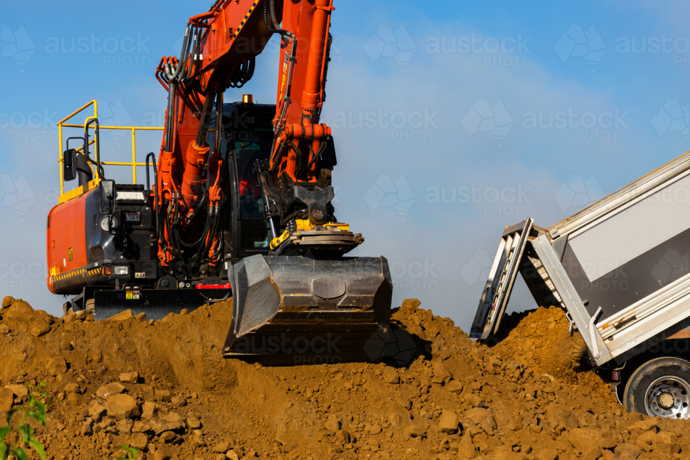 Image of Excavator earthmoving equipment working at construction site ...
