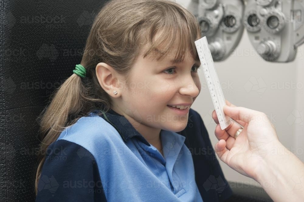 Image Of Eye Test Reading The Chart Austockphoto image-of-eye-test-reading-the-chart-austockphoto