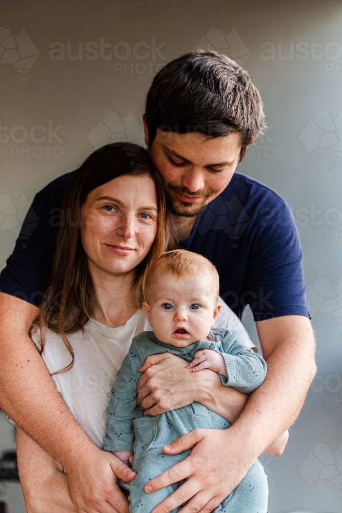 Image of family of three parents in late twenties early thirties with ...