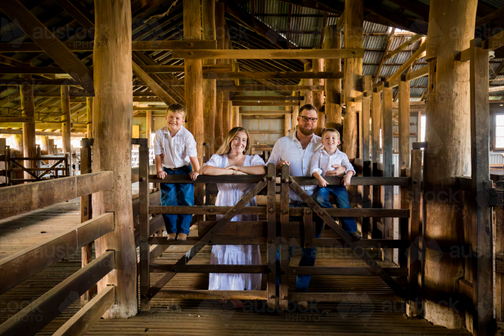 Image of Family portrait in the shearing shed - Austockphoto