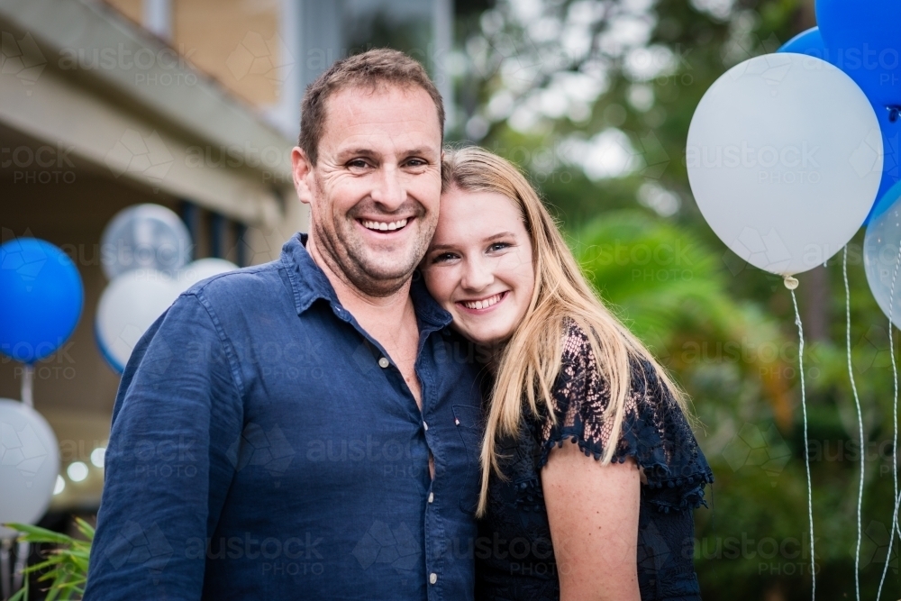 Image of father and daughter, 18th birthday party - Austockphoto