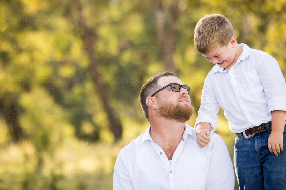 Image of Father and son portrait in rural Australian bush setting ...