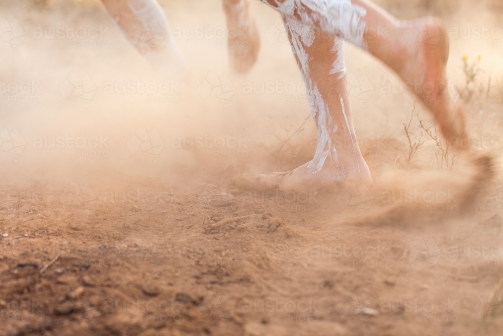 Image of Feet of First nations people dancing in oka paint to tell the ...