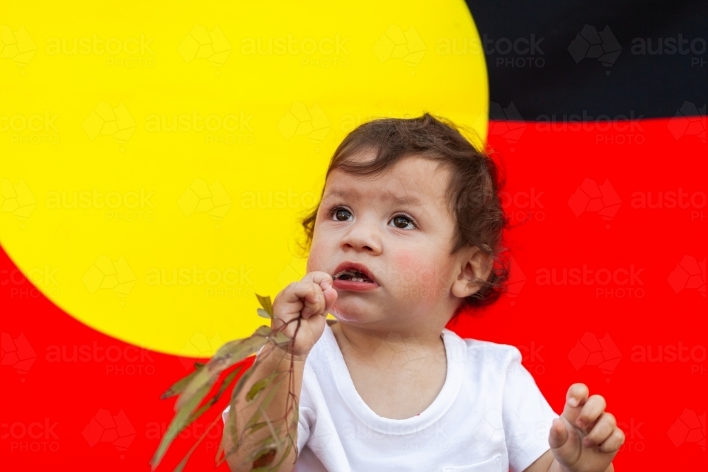 Image of First Nations Australian child looking up against aboriginal ...
