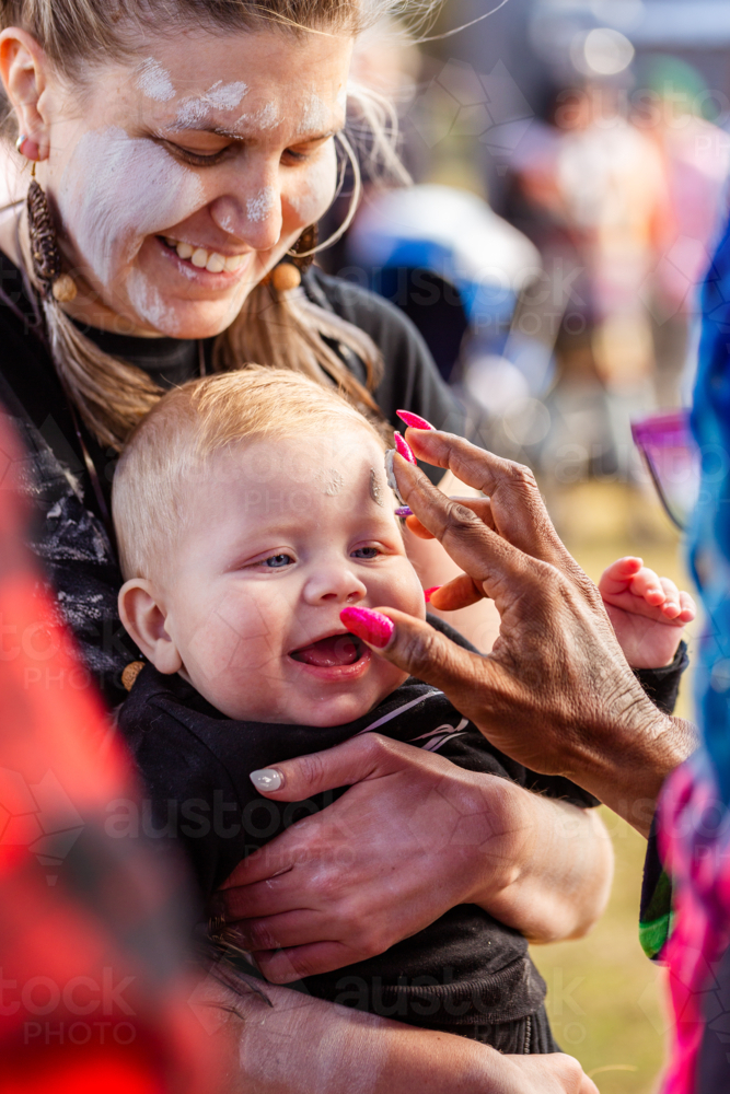 Image of First nations Australian elder welcoming baby to country ...