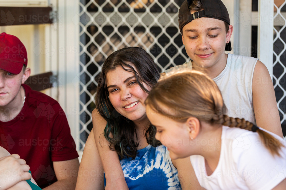 Image of First Nations Australian family members together with teen ...