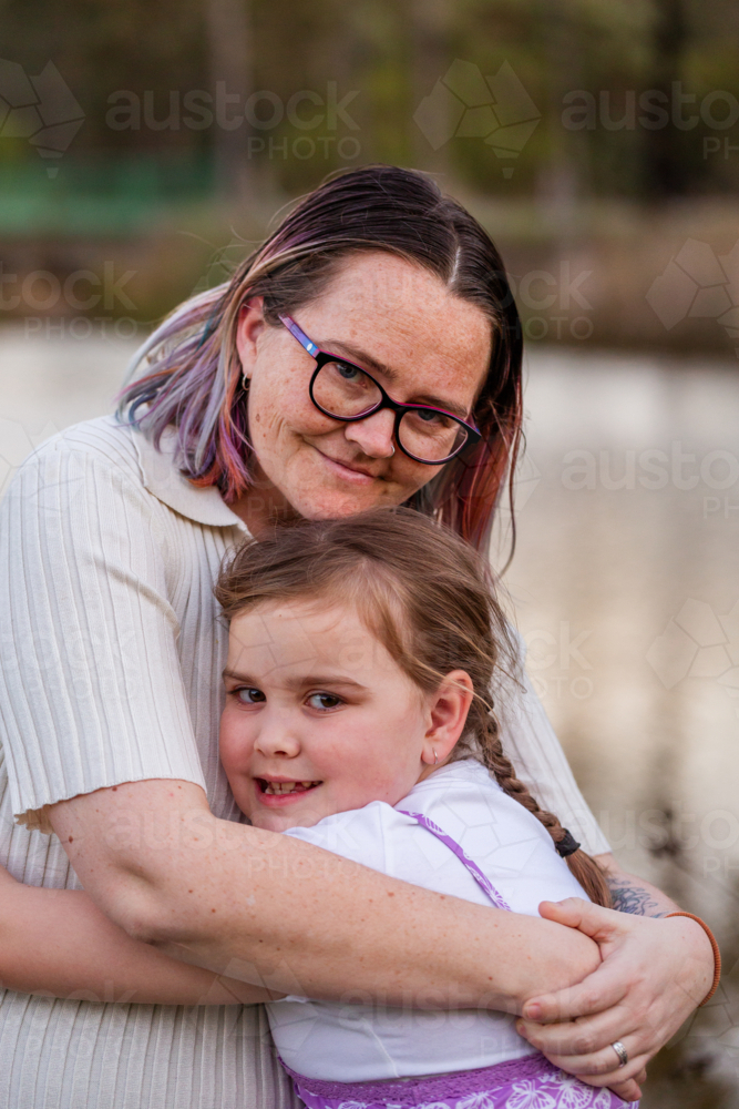 Image of First Nations Australian mother and young daughter hugging ...