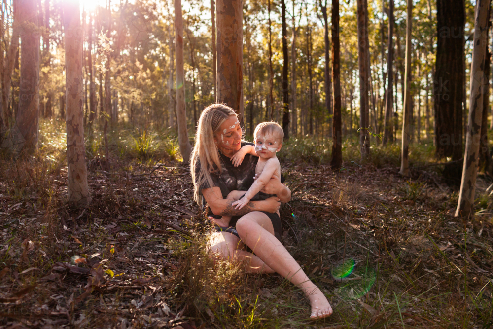 Image of First Nations Australian mum with baby boy sitting enjoying ...
