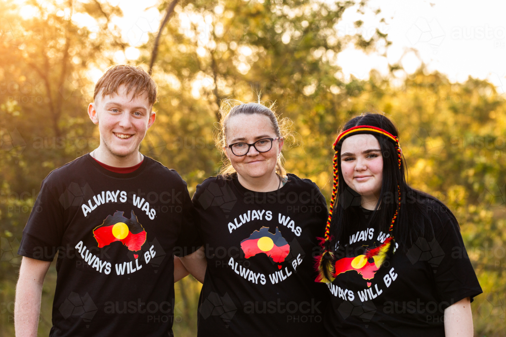 Image of First Nations Australian mum with teenaged son and daughter ...
