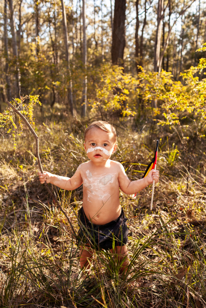 Image of First Nations Australian toddler boy with stick and Aboriginal ...