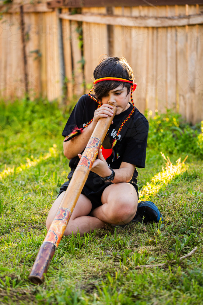 Image of First Nations Australian tween boy in cultural coloured ...