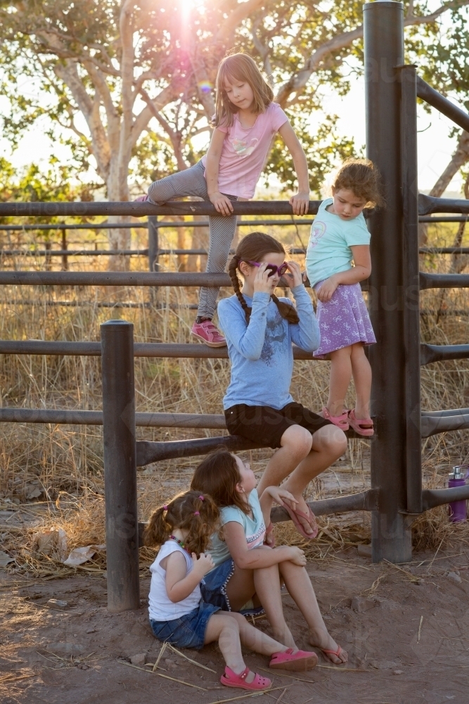 Image of Five children on a station in the outback - Austockphoto